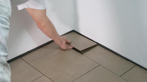 Bodenfliesen verlegen - Anleitung @ diybook.at